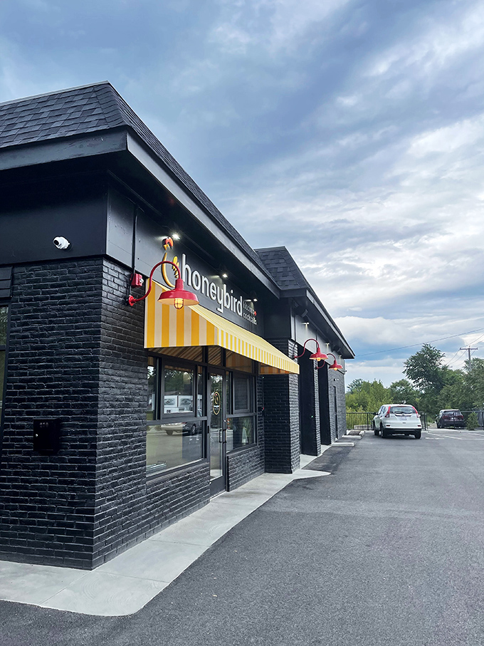 Welcome to Honeybird, where the exterior might be unassuming, but inside lies a clucking good time! This modern farmhouse-chic facade hides a world of flavor.