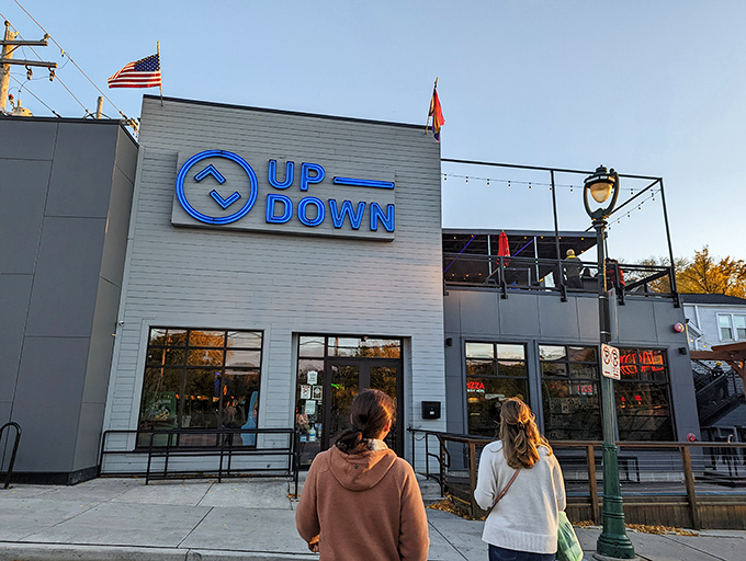 Welcome to the mothership of nostalgia! Up-Down MKE's exterior promises a journey back in time, complete with neon signs and a rooftop patio for stargazing between rounds.