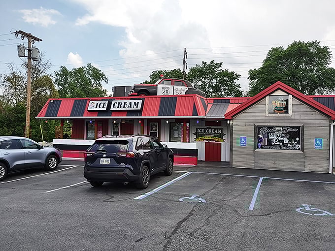 Step back in time! The Speedtrap Diner's vibrant red-and-white exterior is like a beacon calling all hungry time travelers to refuel their DeLoreans.