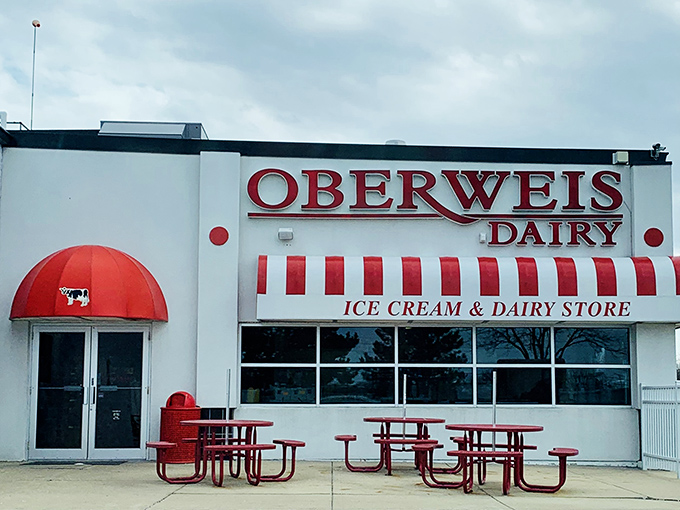 Welcome to dairy paradise! Oberweis beckons with its iconic red awning and promise of creamy delights. It's like Willy Wonka's factory, but for ice cream lovers.