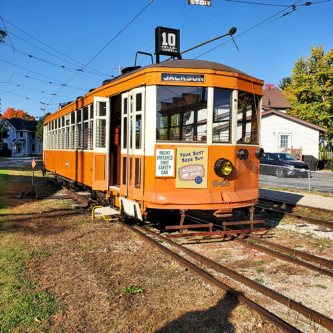 "All aboard the time machine!" This vibrant orange trolley isn't just a pretty face&mdash;it's your ticket to a bygone era of transportation magic.