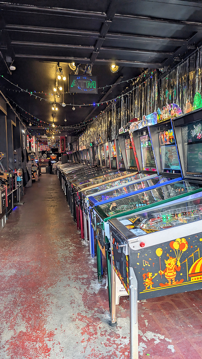 Step into a neon-drenched time warp! Free Gold Watch's storefront beckons like a siren song for your inner arcade wizard.