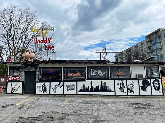 Welcome to BBQ wonderland! Daddy D'z exterior is a feast for the eyes, with its quirky signage and pink pig guardian. It's like Willy Wonka opened a smokehouse!