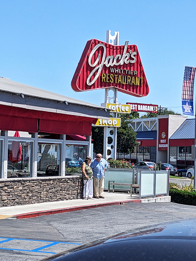 A beacon of breakfast bliss! Jack's iconic red sign promises coffee, comfort, and a journey back to the golden age of diners.