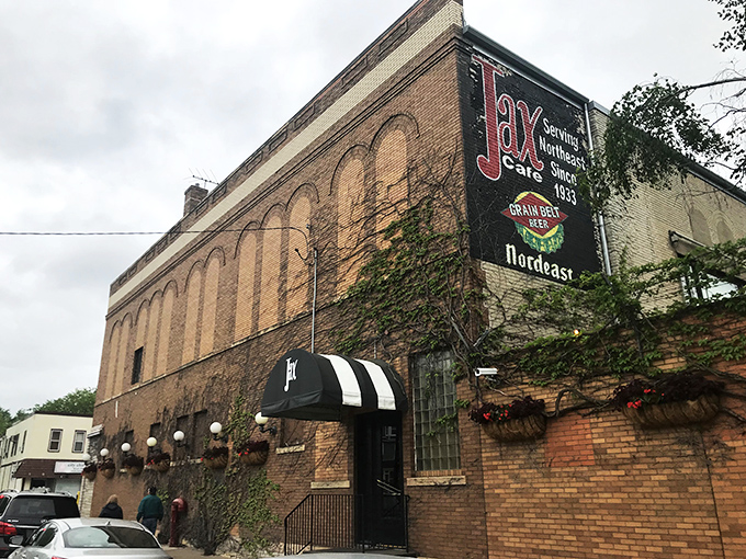 A brick facade that's seen more stories than a librarian's book club. Jax Cafe stands proud, its vintage sign a beacon for hungry souls seeking comfort and class.