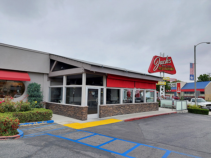 A beacon of breakfast bliss! Jack's iconic red sign promises coffee, comfort, and a journey back to the golden age of diners.