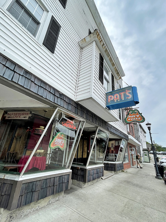 "Pat's Pizza: Where nostalgia meets your taste buds!" This charming facade promises a slice of Orono history and mouthwatering pies that'll transport you back in time.