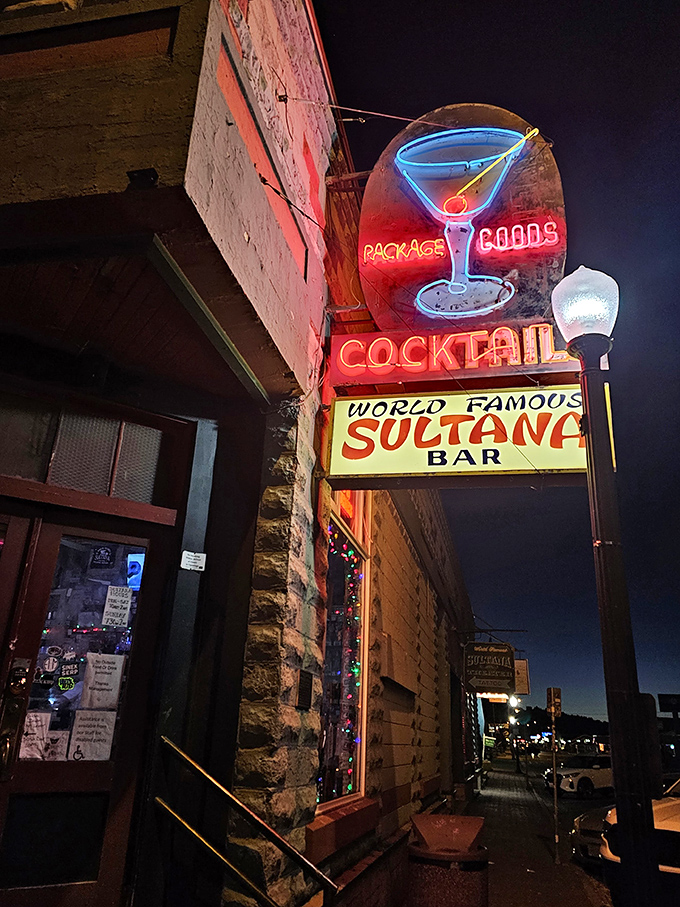 Neon dreams come alive! The Sultana Bar's vintage sign beckons like a siren song, promising cocktails and good times on Route 66.