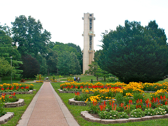 A floral feast for the eyes! Washington Park Botanical Garden's vibrant blooms and towering carillon create a symphony of nature and architecture.