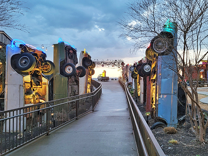 Welcome to Truck Yard, where junk becomes art and fun is always on the menu! This eclectic entrance sets the tone for a truly unique Texas experience.