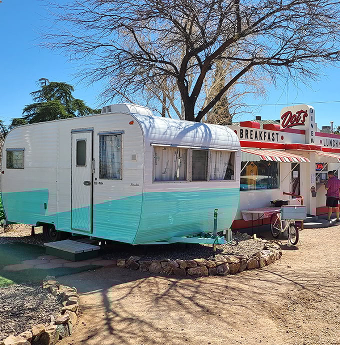 Welcome to the Shady Dell, where nostalgia comes with a side of desert charm! This retro oasis is like stumbling onto the set of "Happy Days" &ndash; if the Fonz traded his leather jacket for a cowboy hat.