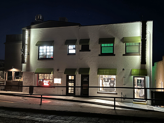 Nighttime charm! The Haunted Hamburger glows like a beacon for hungry ghost-hunters and burger enthusiasts alike. Who ya gonna call? Your dinner date!