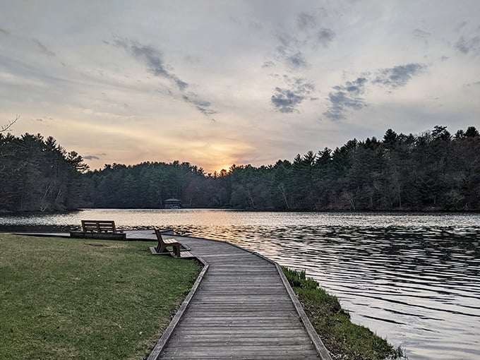 Sunset serenity: Where nature puts on a show that rivals any Broadway production. This wooden walkway invites you to take a front-row seat.