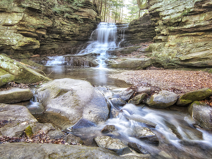Nature's own multi-tiered cake, frosted with rushing water. Honey Run Waterfall serves up slices of serenity, no fork required!
