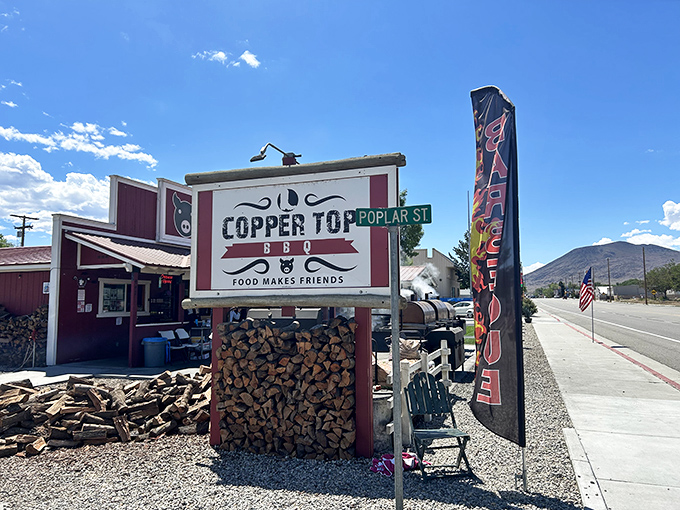 Welcome to barbecue paradise! Copper Top BBQ's charming exterior promises smoky delights against a backdrop of mountain majesty.