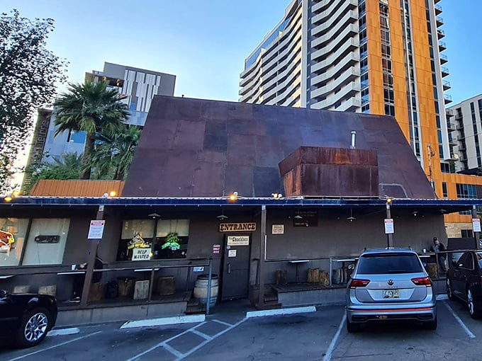Welcome to burger paradise! The Chuckbox's rustic exterior is like a time machine disguised as a shack, promising mesquite-grilled delights inside.