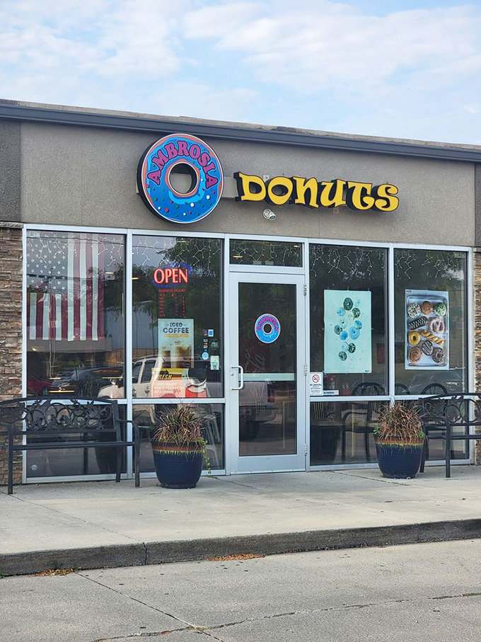 Welcome to donut paradise! Ambrosia's storefront promises a world of sweet delights, with a dash of small-town charm that'll make your taste buds do a happy dance.