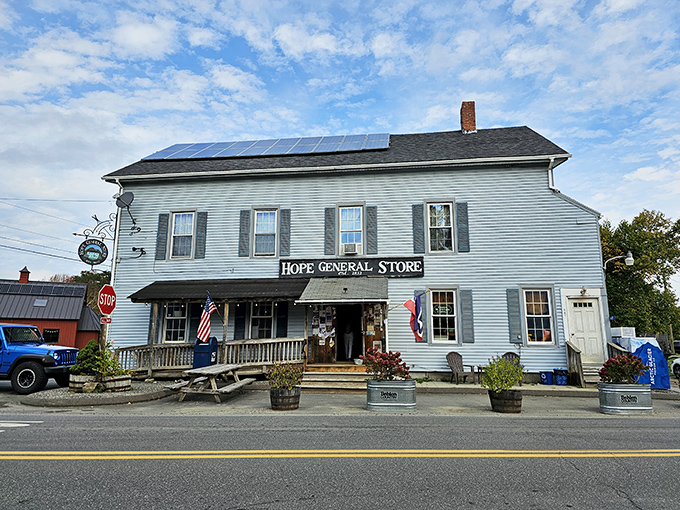 A slice of Americana with a hoppy twist! The Hope General Store stands proud, its weathered clapboards whispering tales of cold beers and warm conversations.