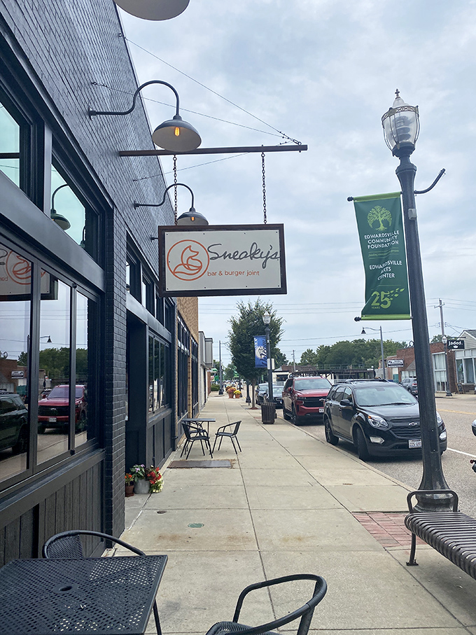 Welcome to Sneaky's, where the fox logo isn't the only clever thing you'll encounter. This charming storefront promises burgers and brews that'll make your taste buds do a happy dance.