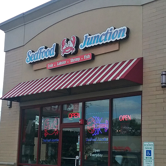 Welcome to Seafood Junction, where the red and white awning beckons like a lighthouse guiding you to delicious waters!