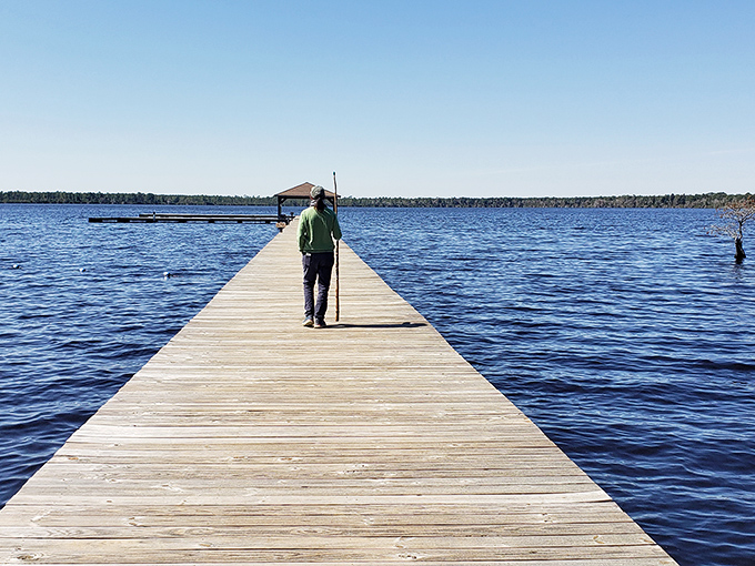 Who needs a Caribbean getaway when you've got this? Singletary Lake's wooden pier stretches into tranquil waters, inviting you to leave your worries on the shore.