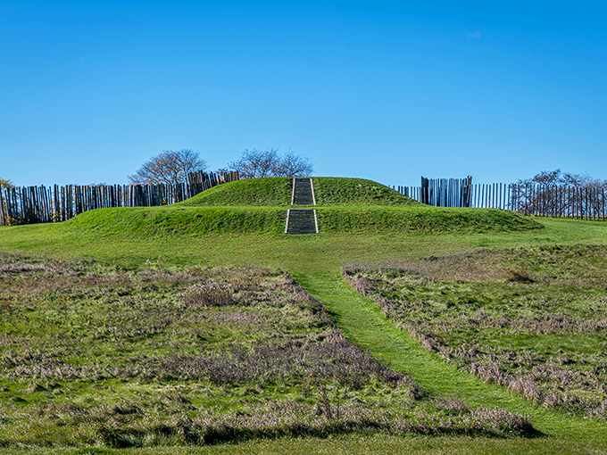Ancient engineering meets Midwest charm! This grassy mound with its wooden stockade is like a prehistoric skyscraper &ndash; minus the elevator and overpriced coffee shop.