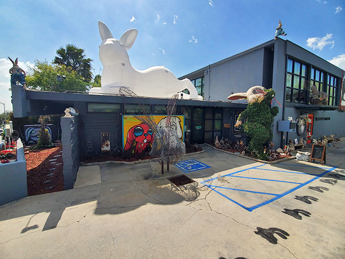 Welcome to bunny paradise! This whimsical wonderland looks like the Easter Bunny's summer home, complete with a giant rabbit guardian perched on the roof.