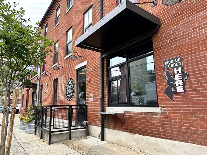 A beacon of crispy goodness in the night! Love & Honey's storefront promises a fried chicken adventure that'll make your taste buds do a happy dance.