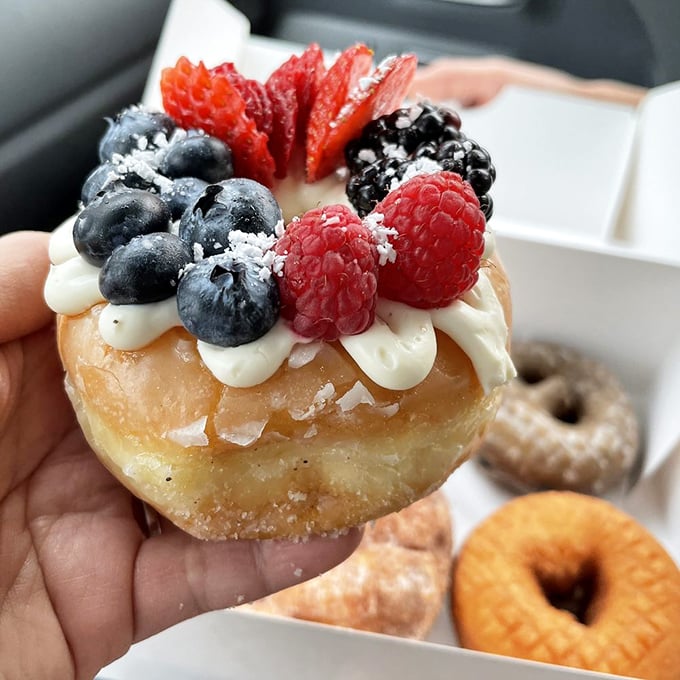 A donut or a work of art? This berry-topped masterpiece is giving 'eat the rainbow' a whole new meaning.