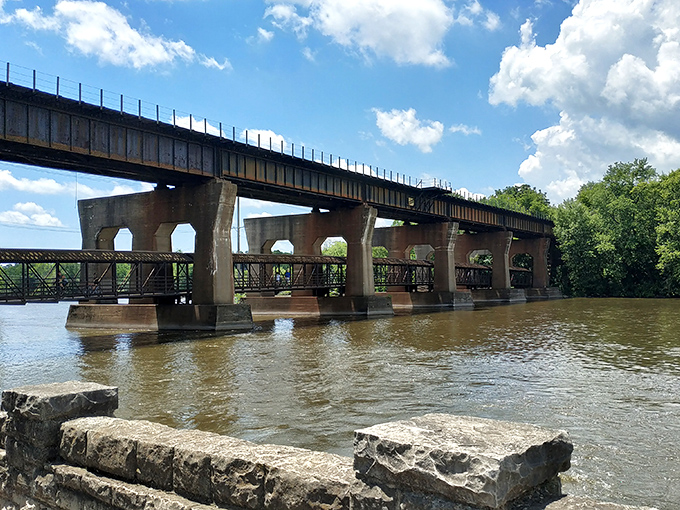 Bridging the gap between nature and engineering: This sturdy span invites both train enthusiasts and river gazers alike.