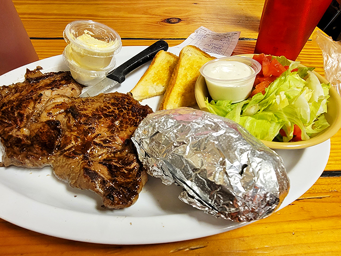 Pork perfection achieved! This grilled chop is the Michelangelo's David of meat – a true masterpiece that belongs in a museum… of deliciousness.