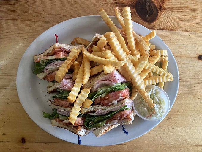 A sandwich so tall, it needs a building permit. Packed with ham and veggies, it's a skyscraper of flavor in every bite.