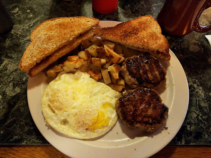 Rise and shine, it's comfort food time! This breakfast plate is like a warm hug from your grandma, if your grandma was a culinary genius.