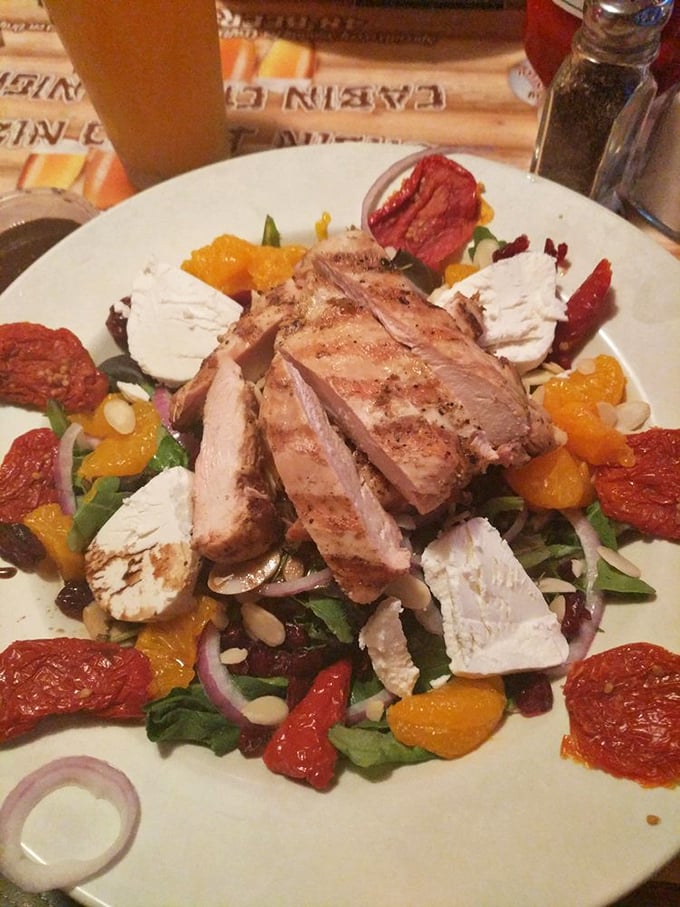 A salad that's anything but boring! This Mesclun mix is a vibrant canvas of flavors, topped with grilled chicken that's clearly living its best life.