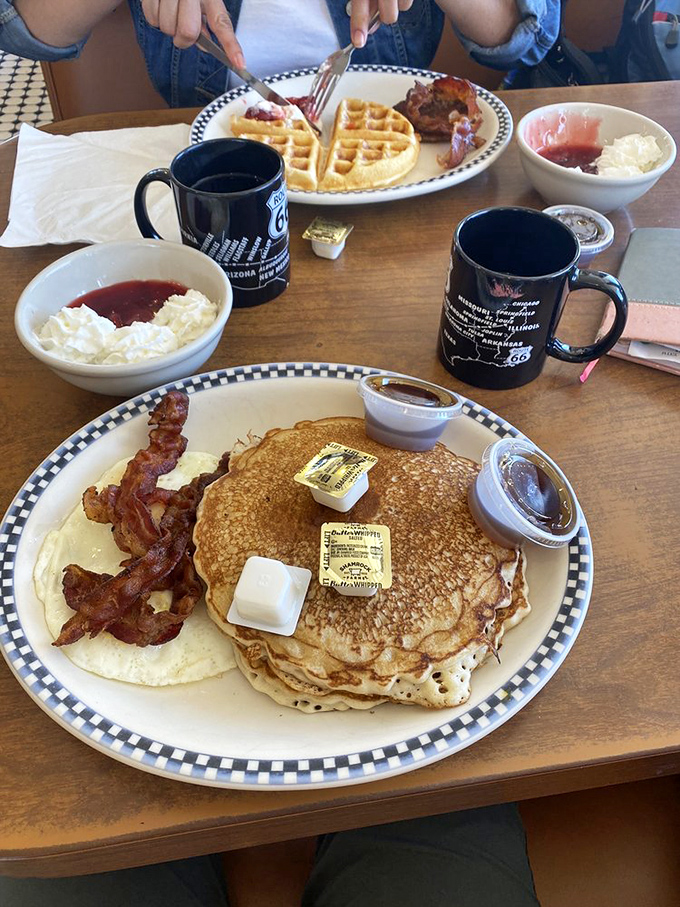 Pancake paradise found! These fluffy stacks are giving the Grand Canyon a run for its money in the "awe-inspiring sights" department.