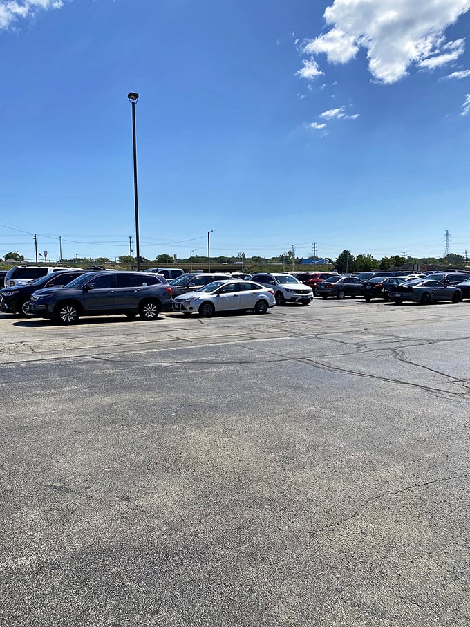 Parking lot or impromptu car show? 7 Mile Fair's expansive asphalt welcomes vehicles of all shapes and sizes for a day of bargain-hunting bliss.