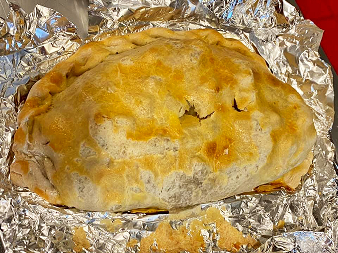 Pasty perfection achieved! This golden pocket of deliciousness isn't just food; it's a warm, flaky hug for your taste buds.