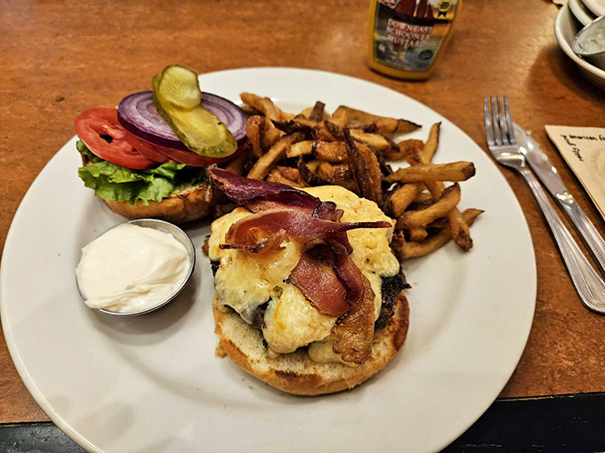 This isn't just a burger, it's a flavor explosion waiting to happen. Pimento cheese and bacon? Be still, my cholesterol-loving heart!