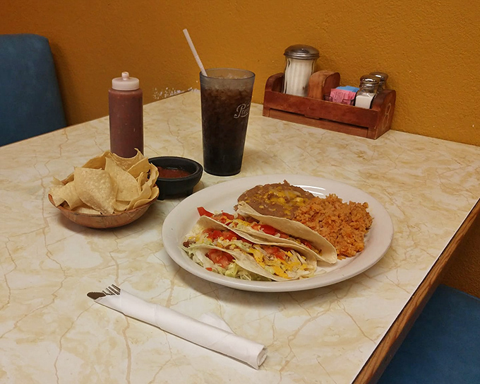 These tacos are redder than a cardinal in a tomato patch! Packed with flavor and ready to rock your taste buds.