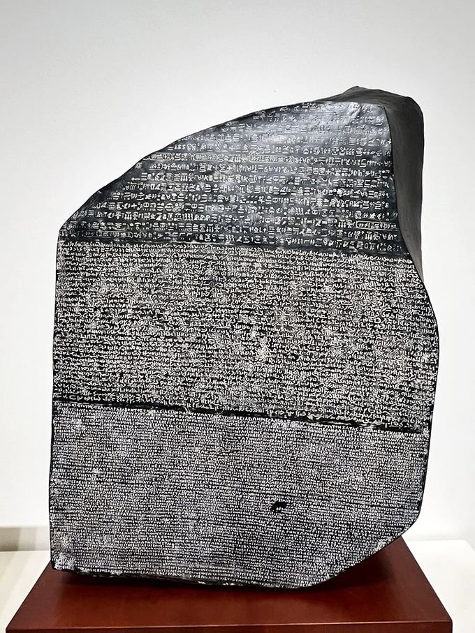 The Rosetta Stone's cousin? This artifact is like the Babel fish of the ancient world, translating mysteries across millennia.