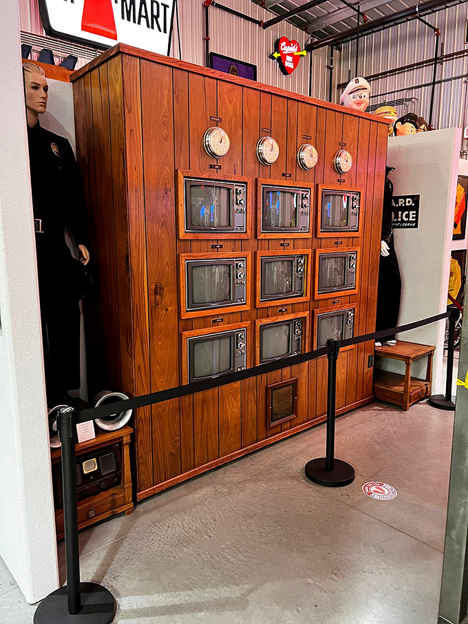 Channel surfing through time! This wall of vintage TVs is like a portal to the days when adjusting rabbit ears was an Olympic sport.