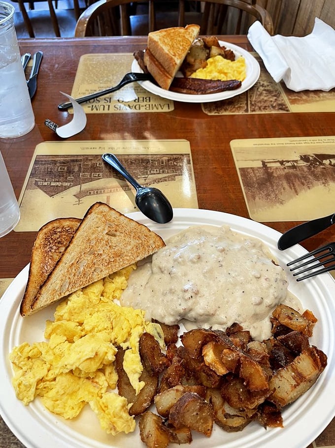 The Country Breakfast: A plate so hearty, it could fuel a lumberjack convention. Biscuits and gravy? More like bliss-cuits and gravy!