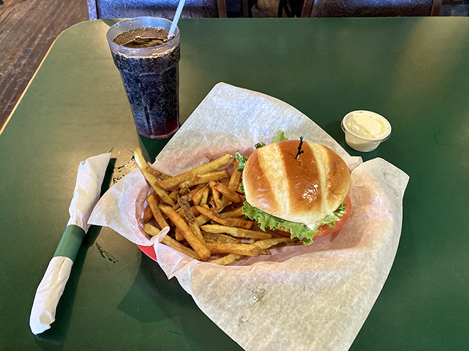 Meet the Antler Burger: a handful of happiness topped with an olive-speared flag. It's like planting your taste buds on a new flavor continent.