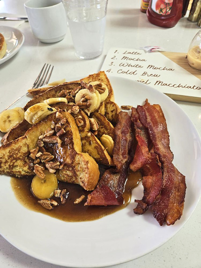 Banana Foster French toast: a breakfast so decadent, it should come with a warning label. "Caution: May cause spontaneous happy dances."