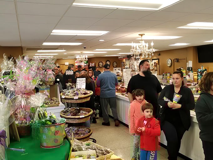 Chocolate brings people together! This bustling shop scene is like a sweet tooth support group, where strangers bond over shared cocoa cravings.