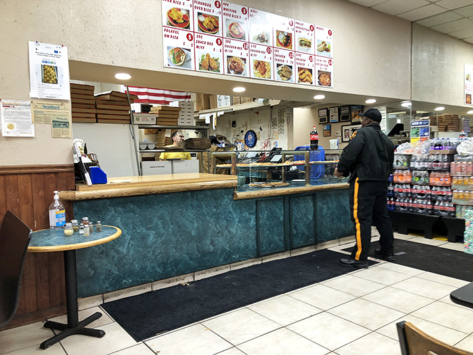 Where the magic happens! This bustling counter is like a portal to poultry paradise. One order, and you're on your way to flavor nirvana.