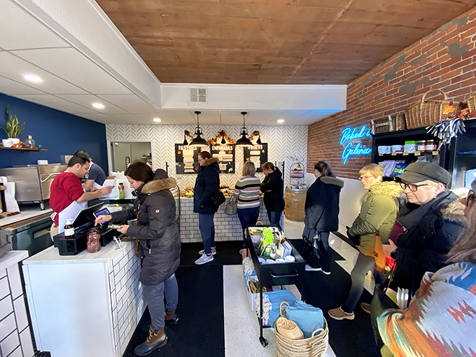 The line for happiness forms here. These folks know that good things come to those who wait... for freshly baked goodies.