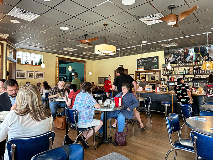 A slice of Americana, served hot and fresh. These diners aren't just eating breakfast; they're savoring a moment of small-town magic.