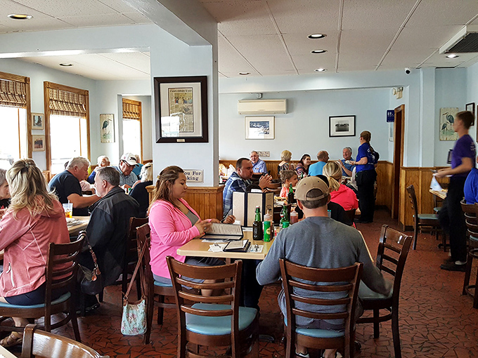 Happy faces, full plates! At O'Steen's, strangers become friends over a shared love of perfectly fried seafood.