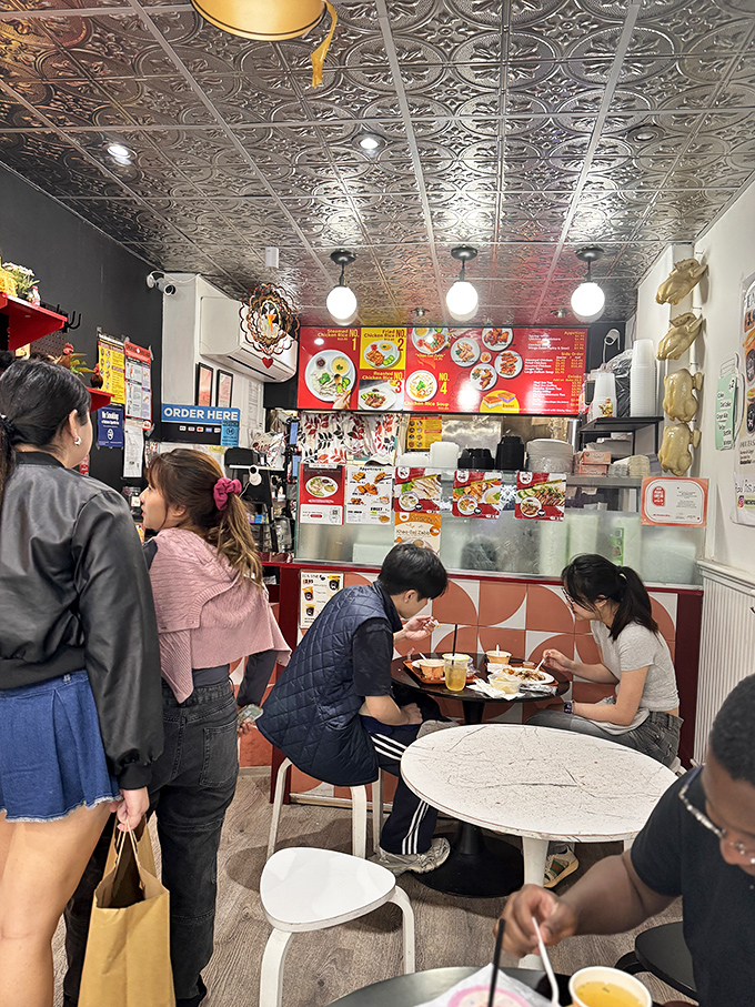 Where food meets fellowship. This bustling interior is where chicken dreams come true and strangers become friends over shared meals.